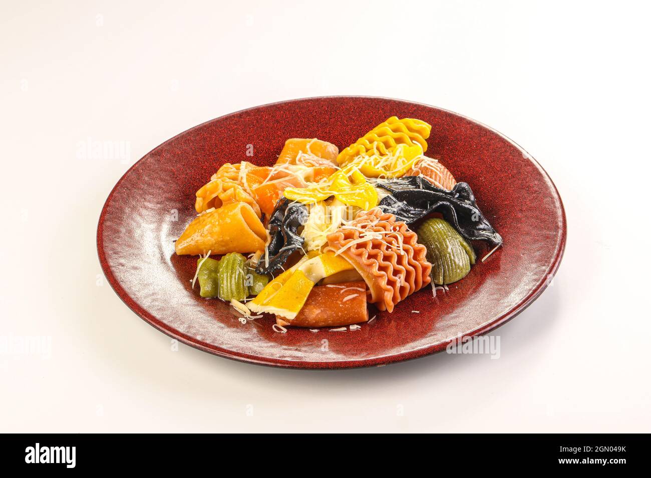 Colour pasta mix for kids weth cheese Stock Photo - Alamy