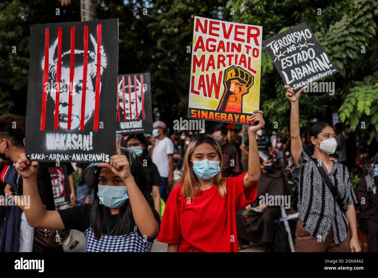 September 21, 2021: Filipino activists hold signs during a protest in ...