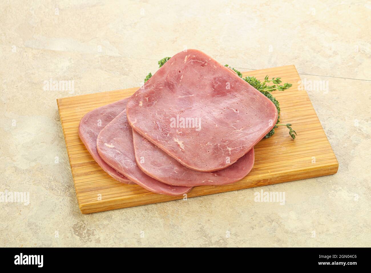 Sliced Beef Ham snack over board Stock Photo - Alamy