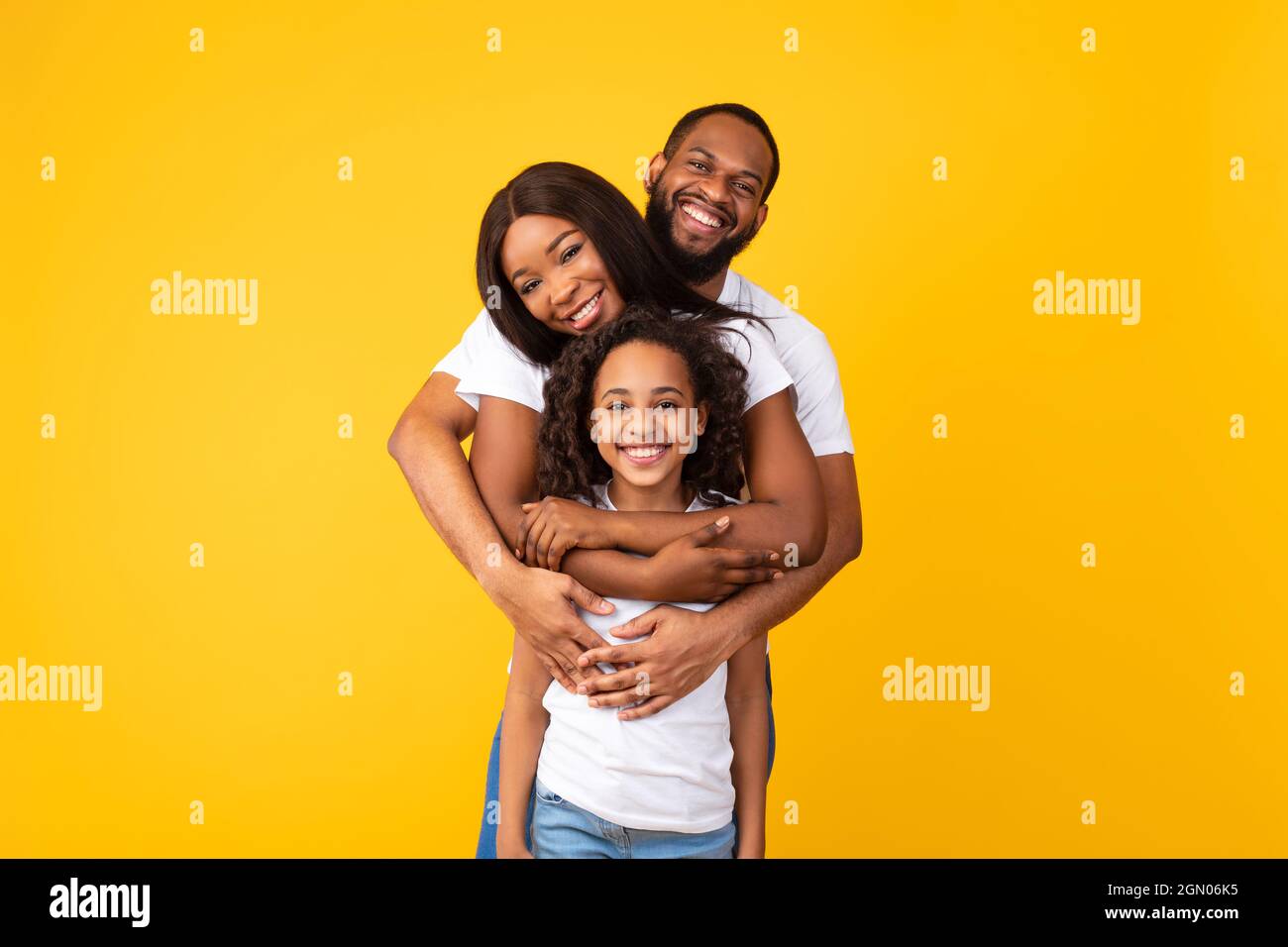 African American Family Hug African American Family Two Daughters