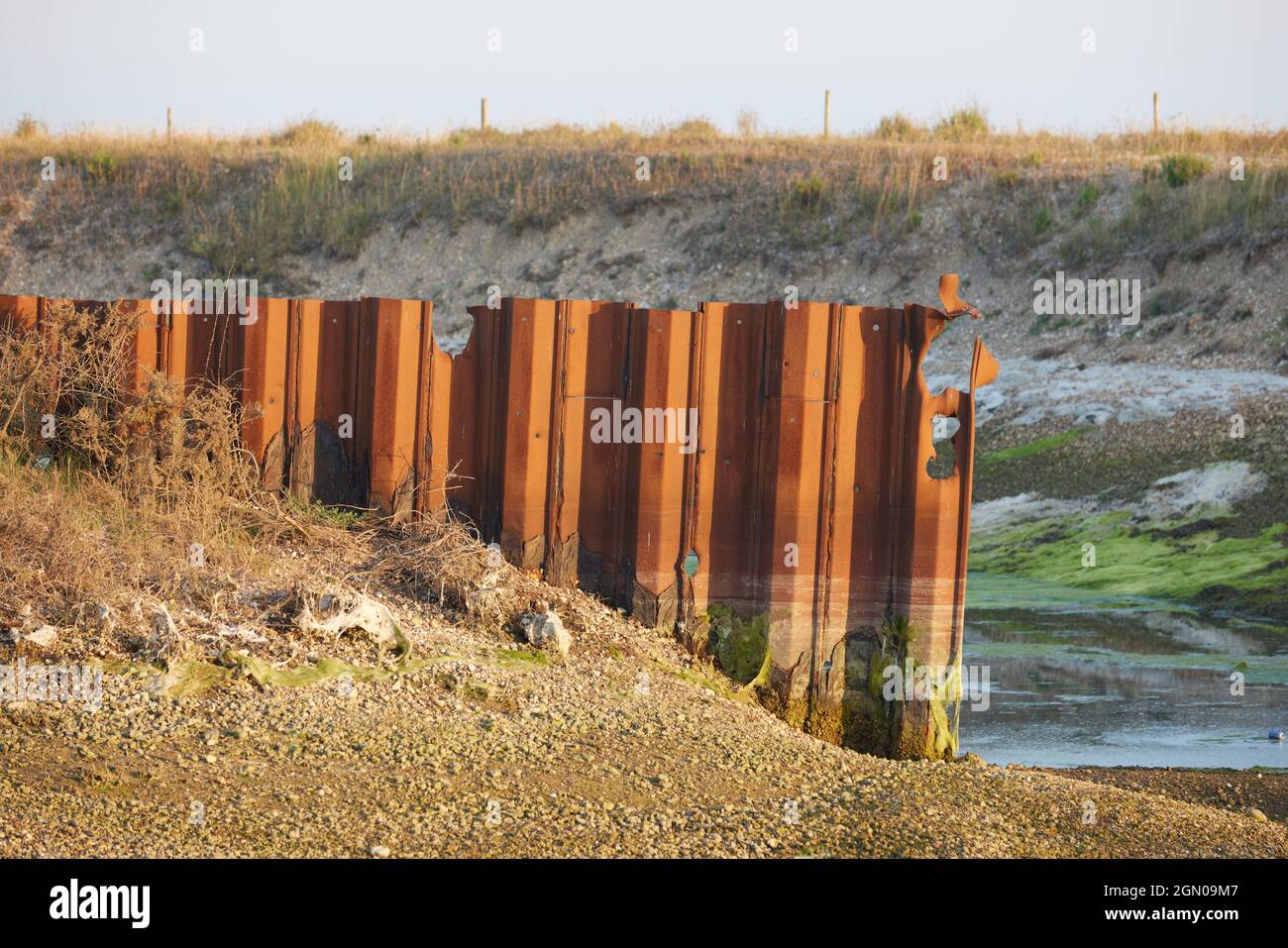 Crumbling iron sea defences seen in Pagham, UK Stock Photo - Alamy
