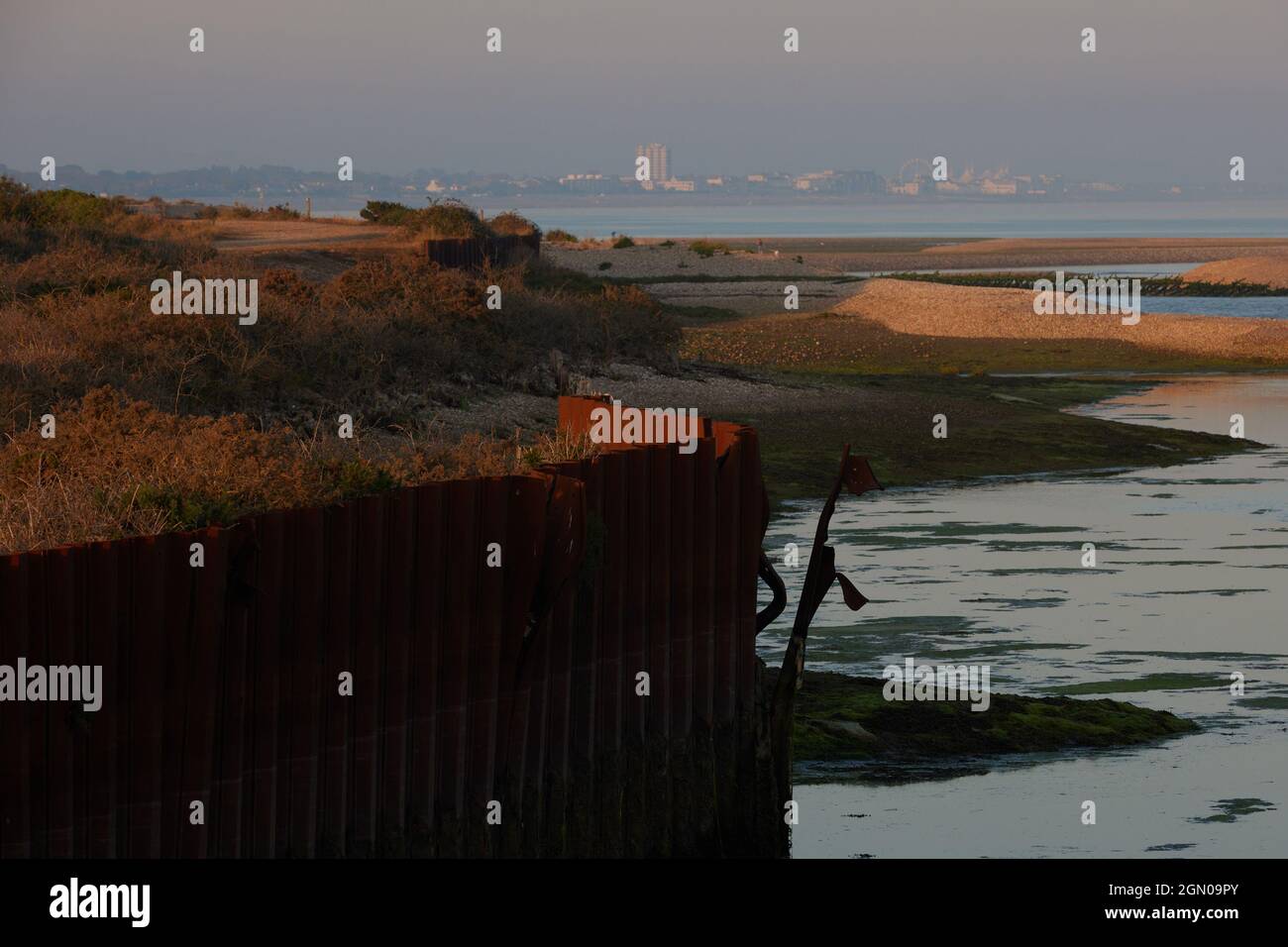 Crumbling iron sea defences seen in Pagham, UK Stock Photo - Alamy