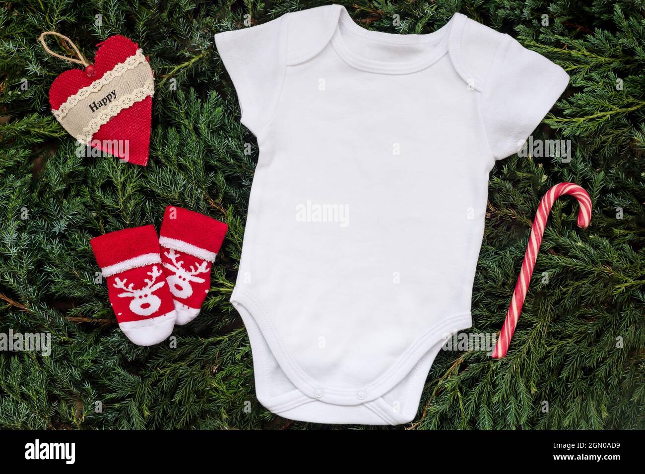 Close up white blank template bodysuit with copyspace and Christmas ...