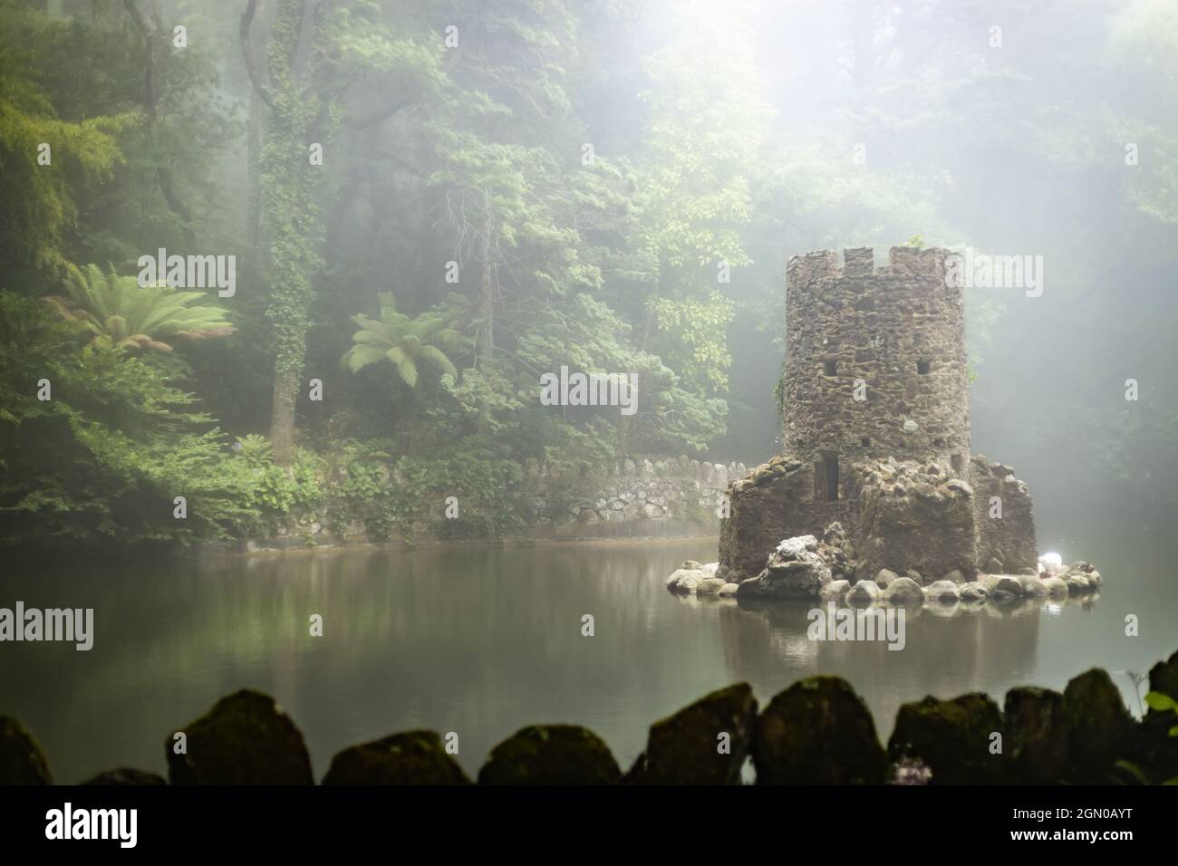 The ruins in the rainy and foggy weather in the forest, Sintra Portugal ...