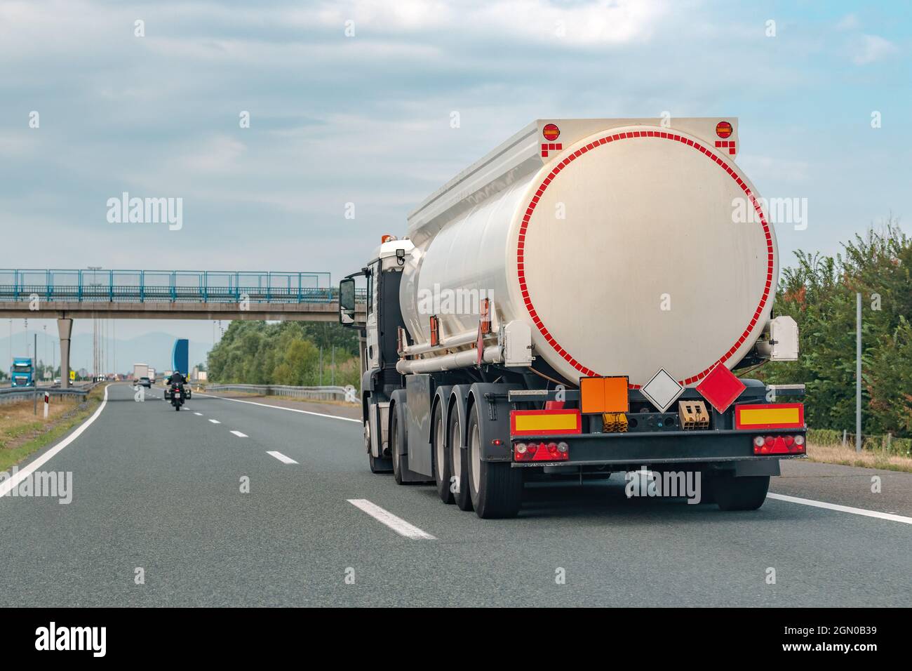 Tank truck on the road transporting gasoline from refinery to gas ...