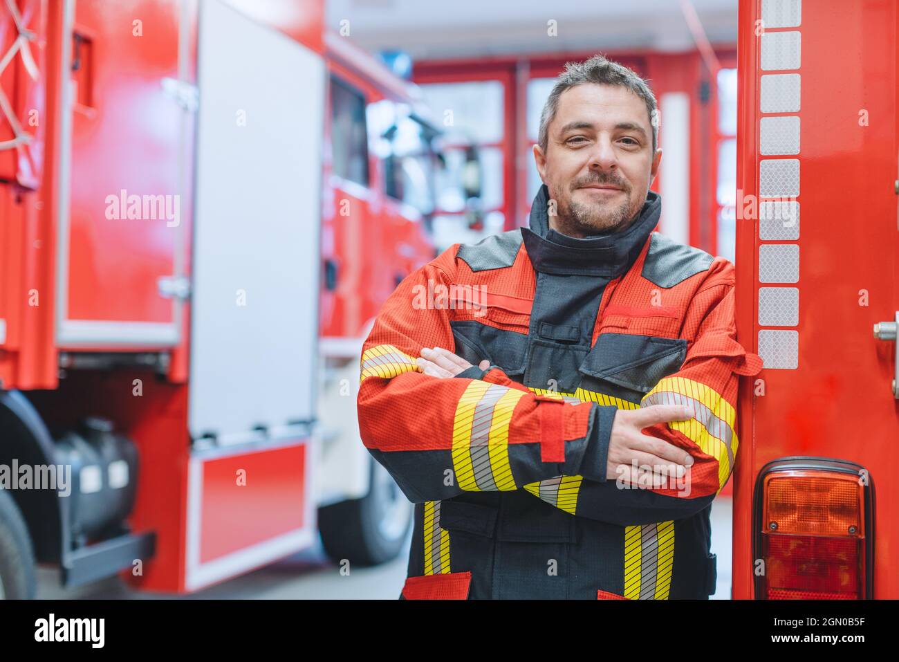 Firefighter in front of fire truck hi-res stock photography and images ...
