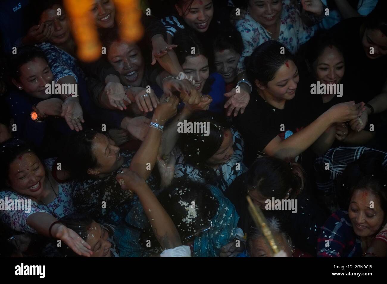 Kathmandu, Nepal. 21st Sep, 2021. Nepalese women struggle to drink ...