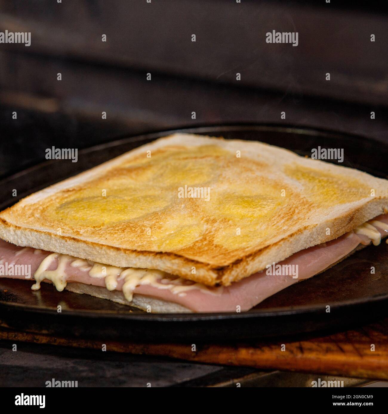 Vertical shot of a serving of toasted ham and cheese sandwich Stock ...