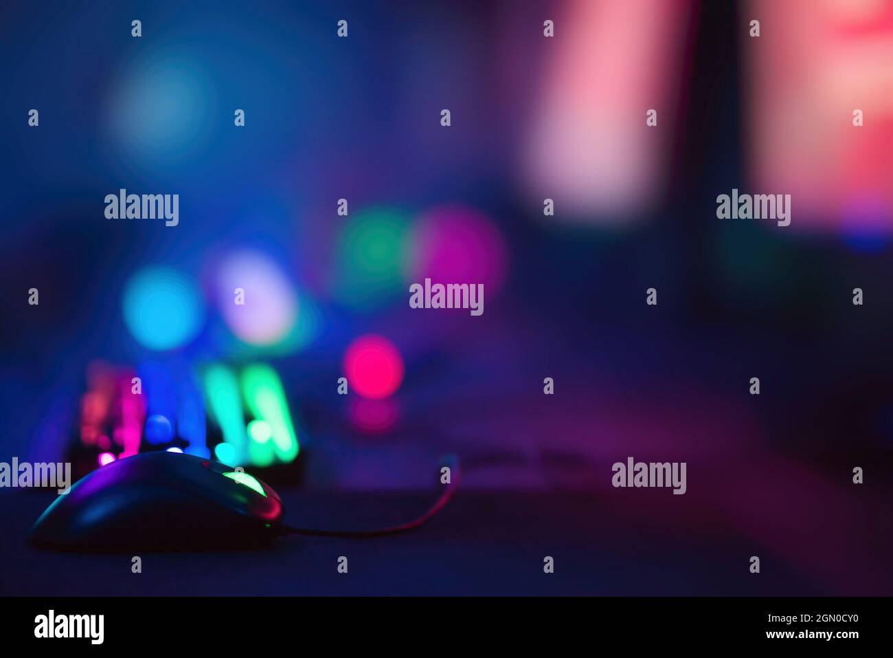 Colorful computer room with selective focus on computer mouse Stock ...