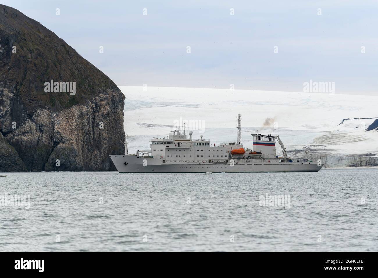 Expedition ship in Arctic sea with ice. White research vessel Stock ...