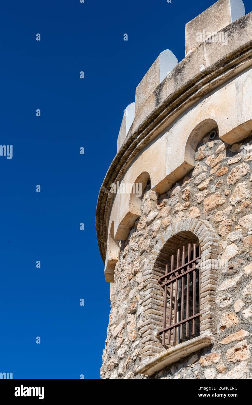 old castle turret with barred window. medieval castle keep with bars on ...