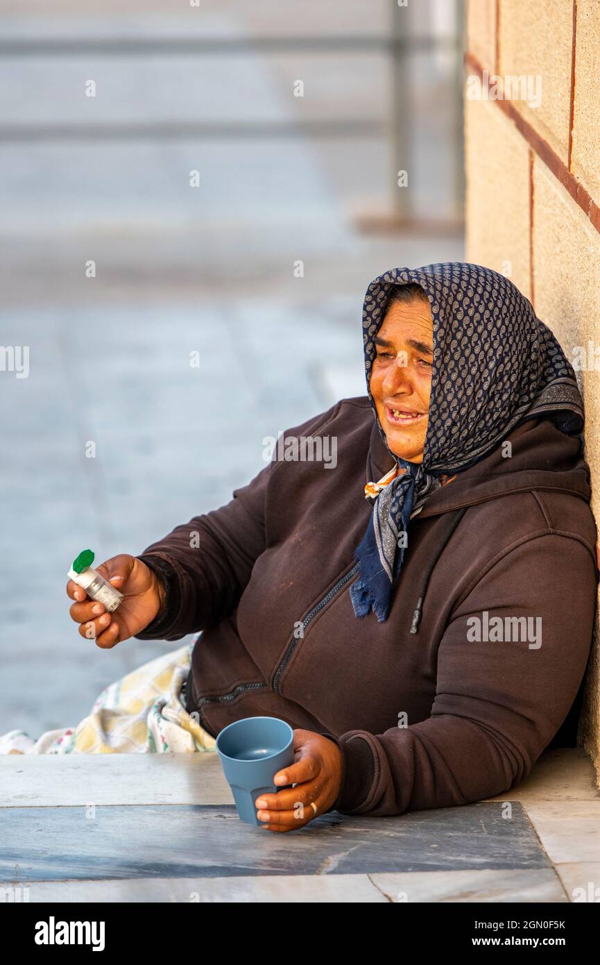 old greek lady, beggar on the street in greece, zakynthos lady begging ...