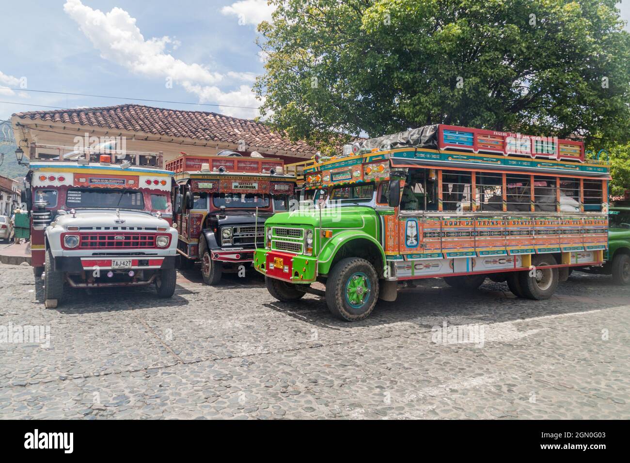 SANTA FE DE ANTIOQUIA, COLOMBIA - SEPTEMBER 3, 2015: Colorful chiva ...