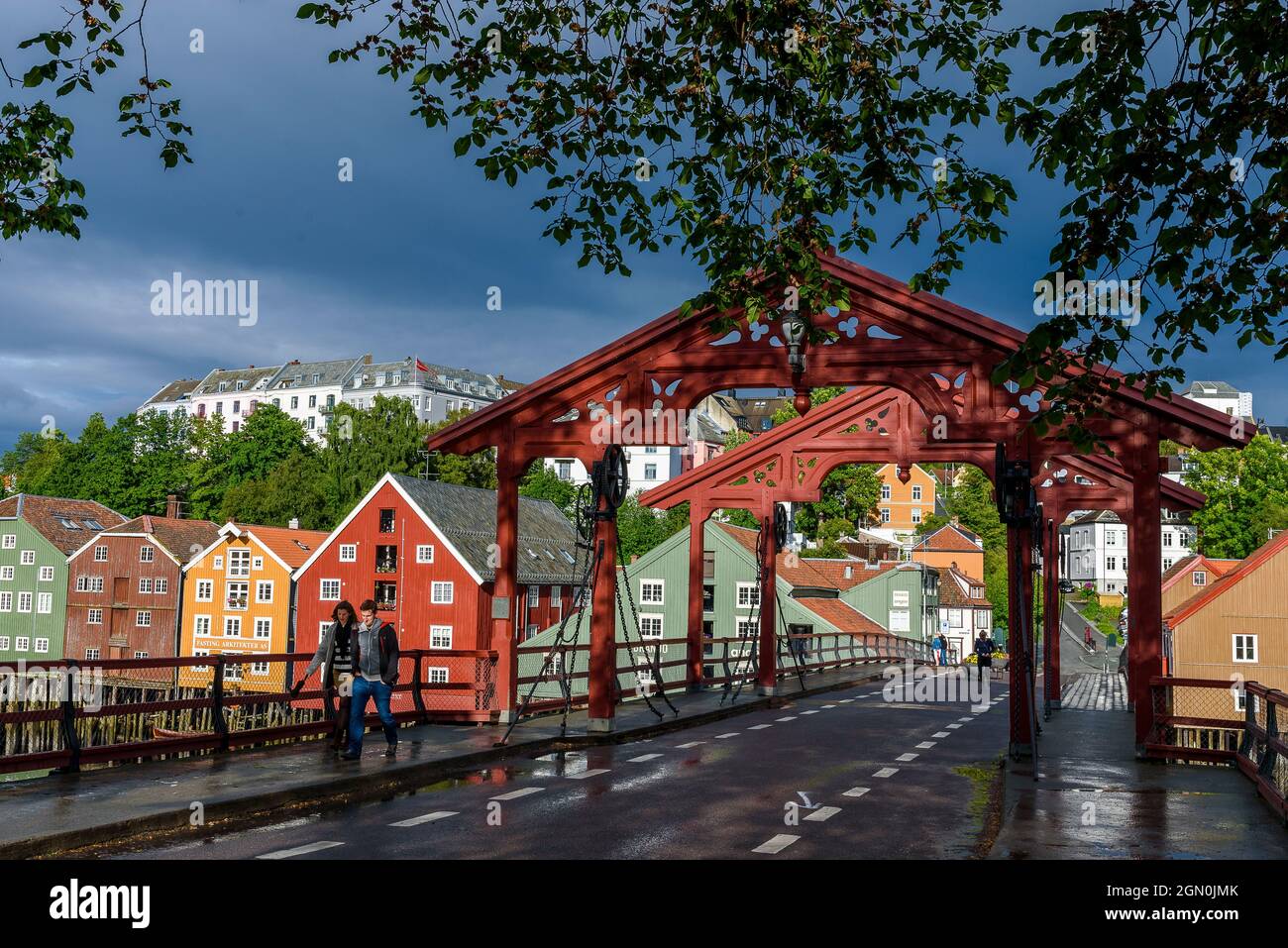 Bybrua bridge on the Nidelv river with old warehouses, Trondheim ...
