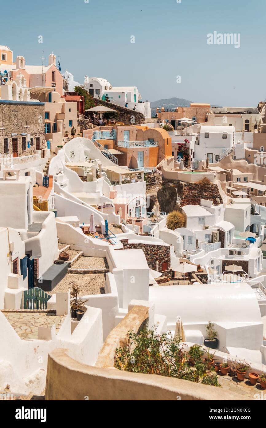 Vertical shot of the coastal buildings of Santorini in Greece Stock ...