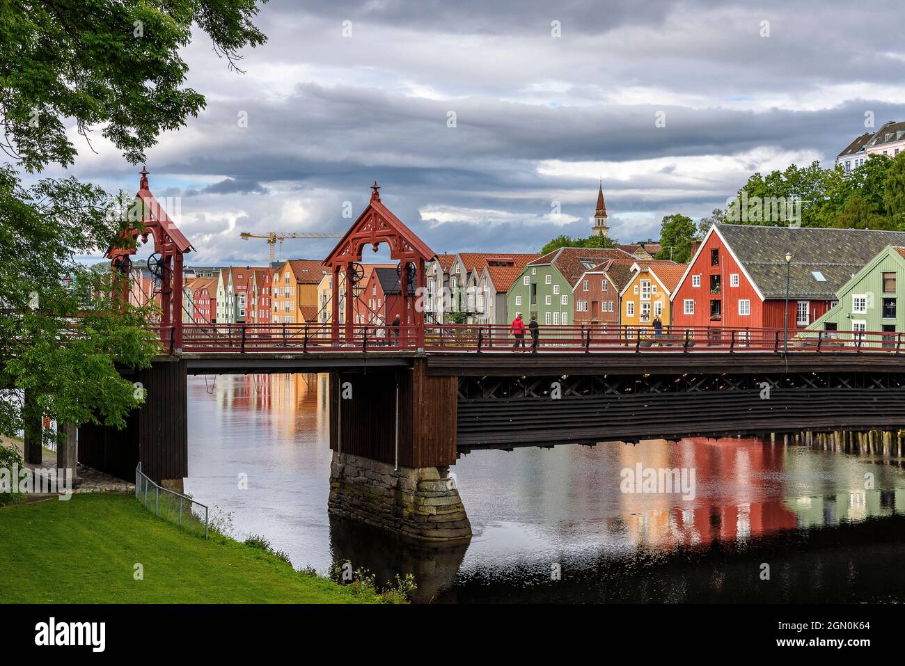 Bybrua bridge on the Nidelv river with old warehouses, Trondheim ...