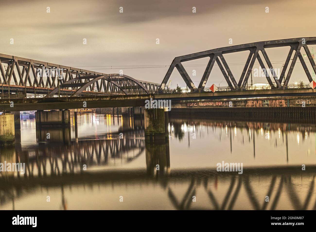 scenic night shot of railway bridge at night Stock Photo - Alamy