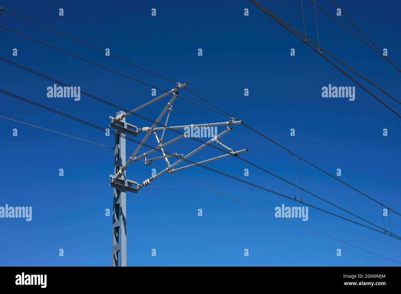 detlle of a metal pole of the catenary of a railway track Stock Photo ...