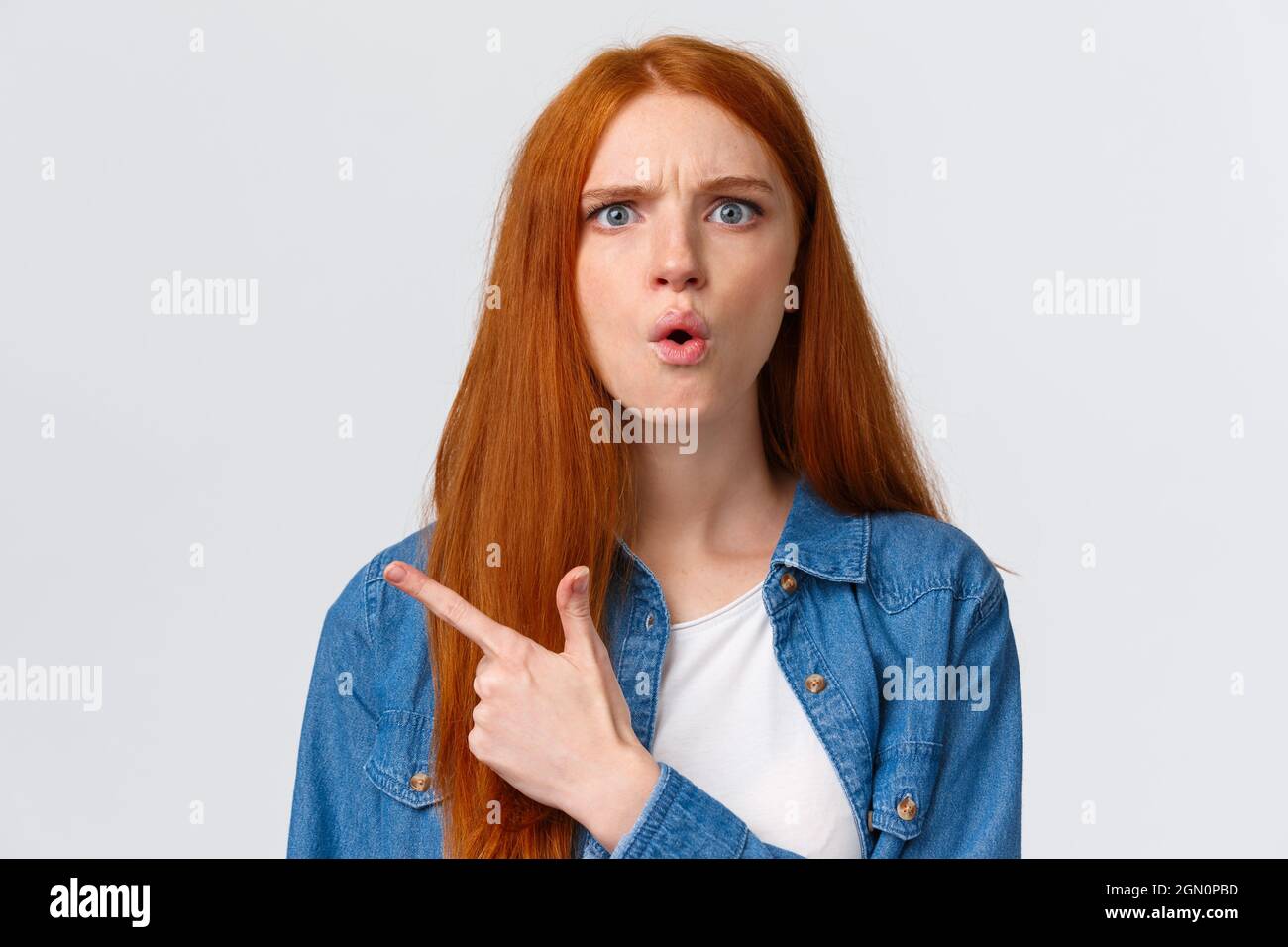 Frustrated and mad, angry complaining redhead woman arguing with ...
