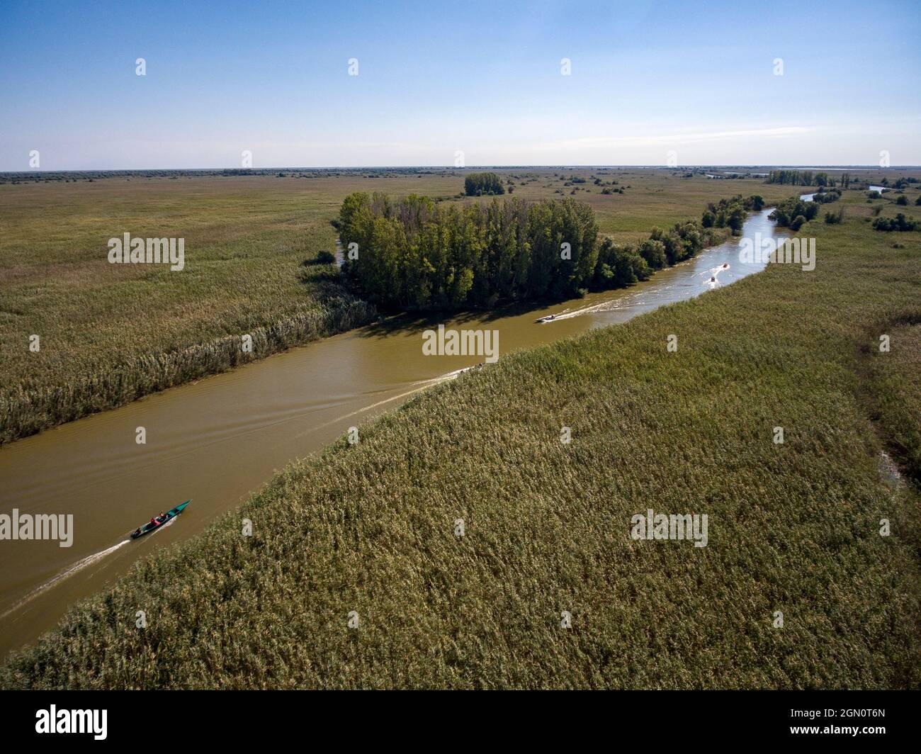 Aerial view of motorboat excursion to wetlands in the Volga Delta, near ...