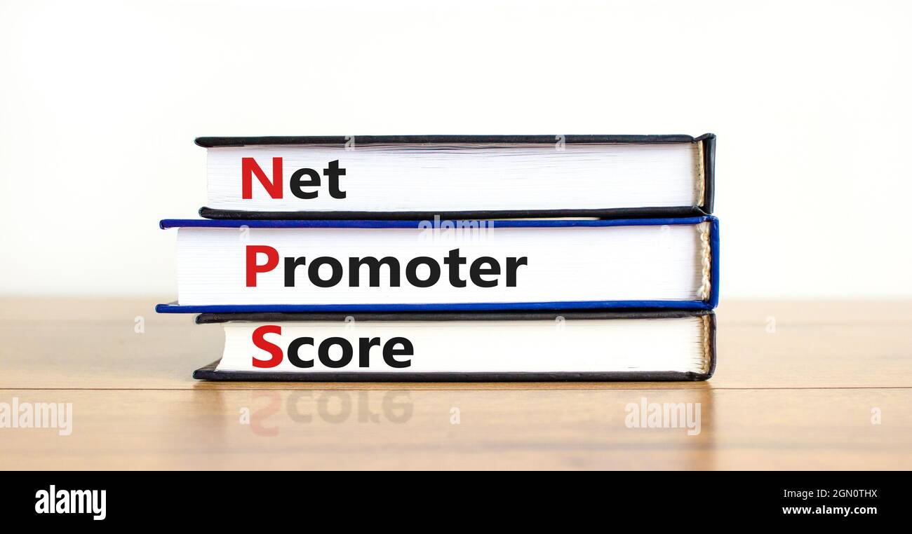 NPS net promoter score symbol. Books with words 'NPS net promoter score ...