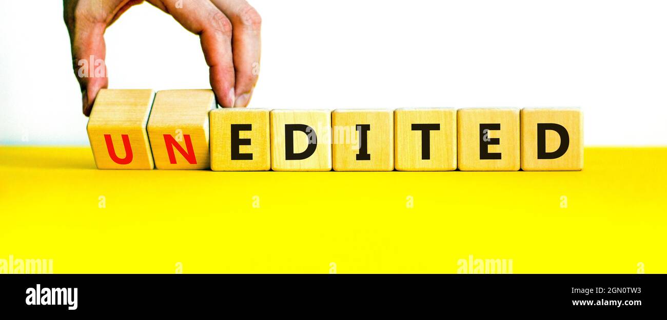 Edited or unedited symbol. Businessman turns wooden cubes and changes ...