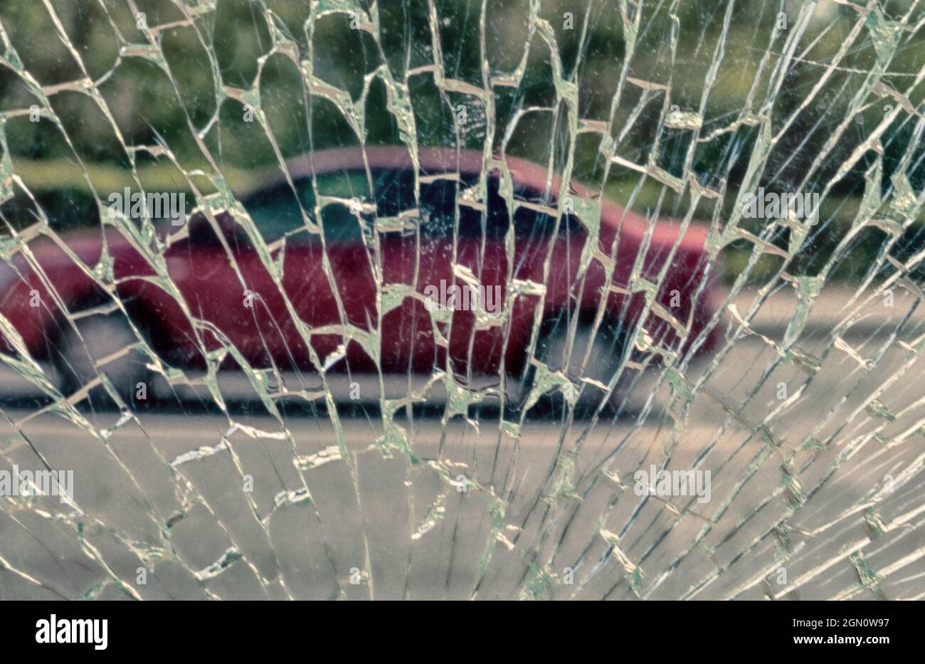 View of city and people through cracked glass. ?ity as habitat with ...