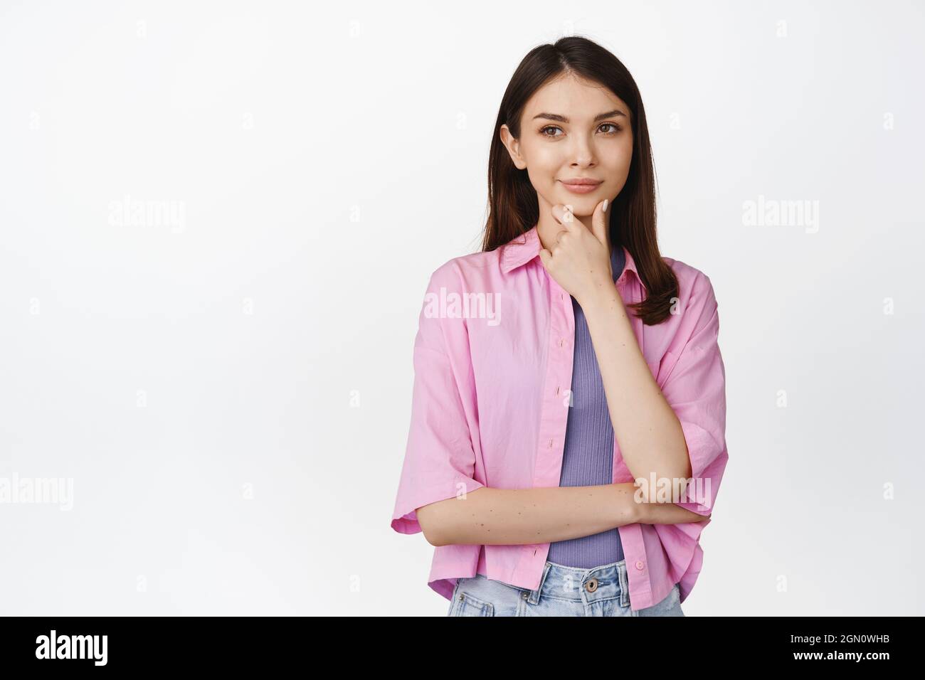 Girl thinking. Smiling thoughtful woman looking curious, making choice ...