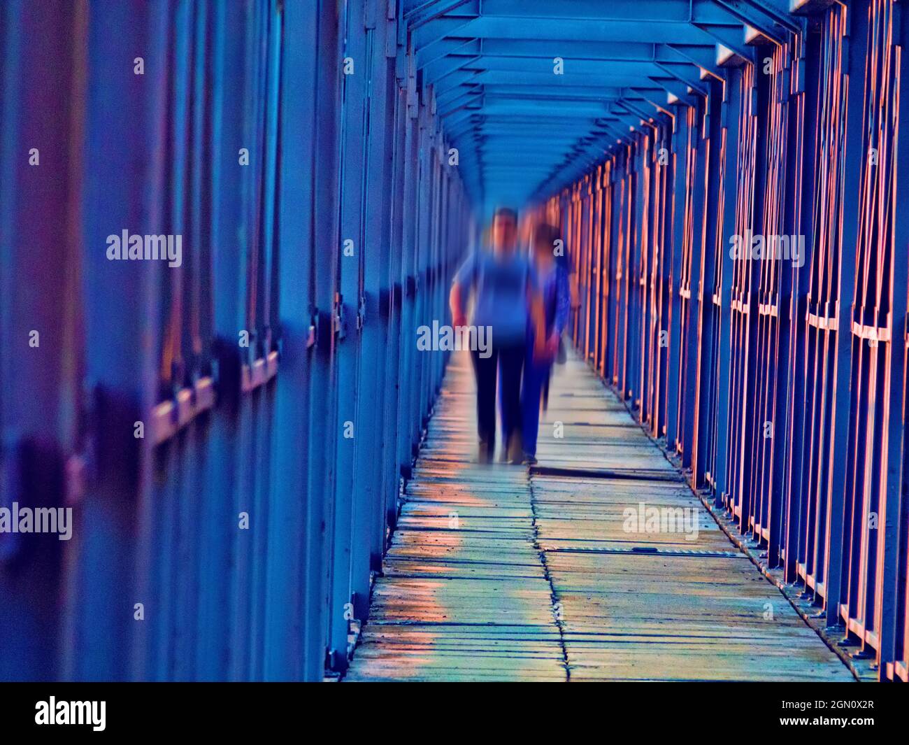 Bridge crossing, pedestrian overpass made of metal structures over the ...