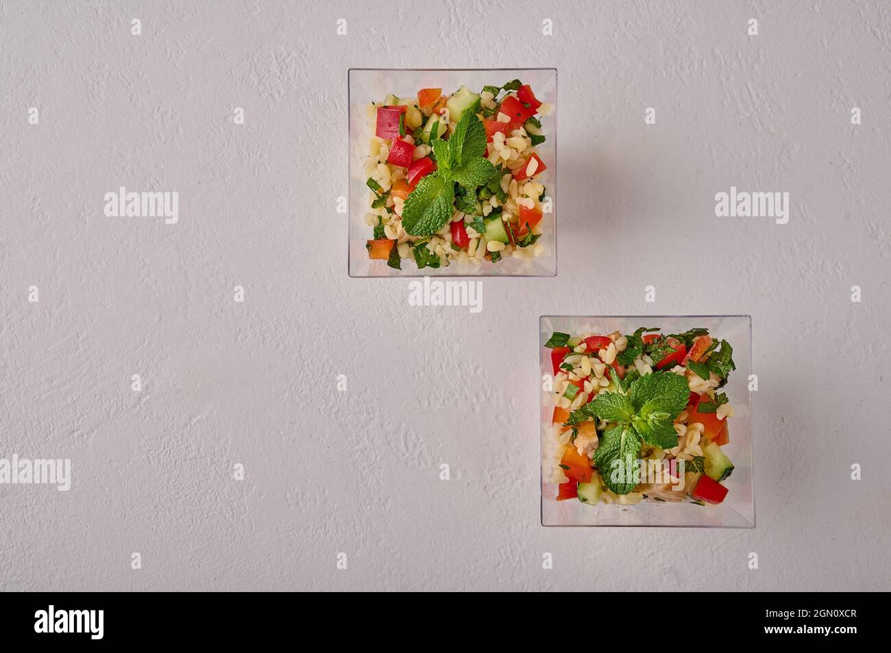 Tabbouleh salad top view. Traditional Middle Eastern dish with parsley ...