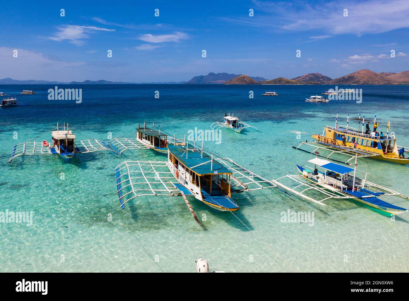 Aerial view of traditional Filipino Banca outrigger canoes on ...