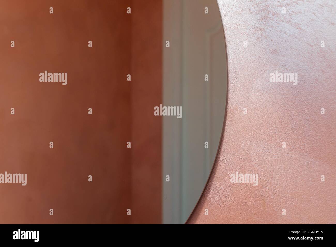 Abstract interior design background, round mirror with blurred ...