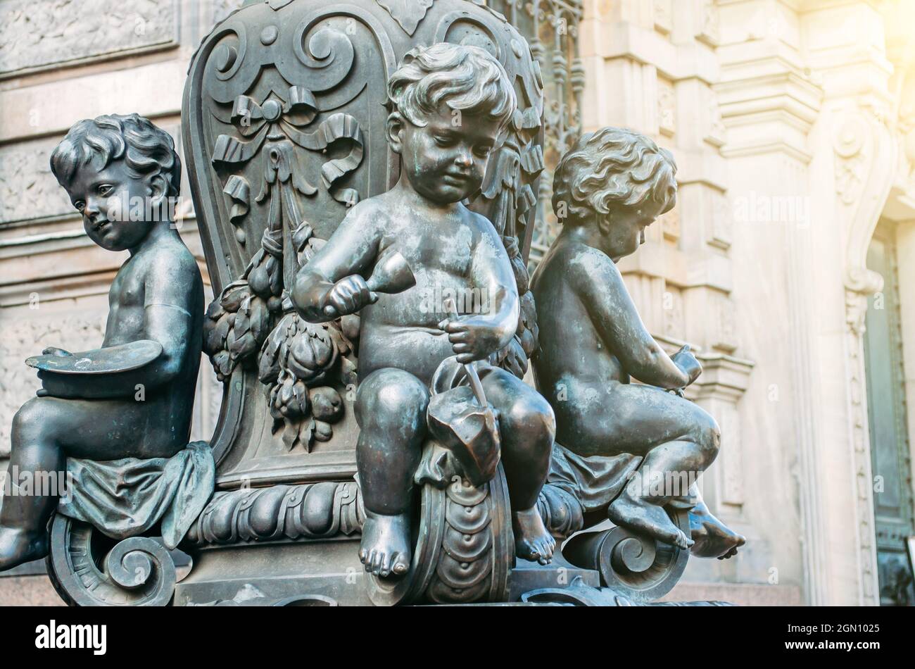 Baby boy sculpture statue infant stone hi-res stock photography and ...