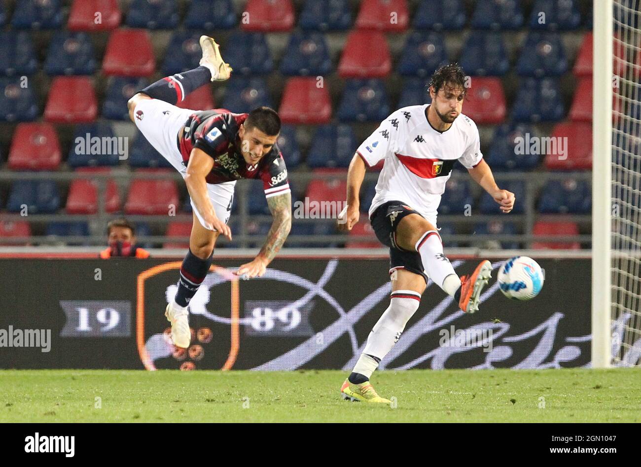 Kevin Bonifazi (Bologna F.C.) (left) competes for the ball with Mattia ...