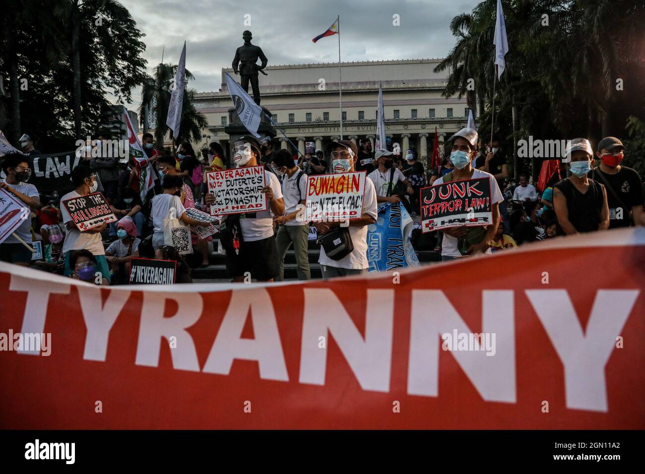 September 21, 2021: Filipino activists hold signs during a protest in ...