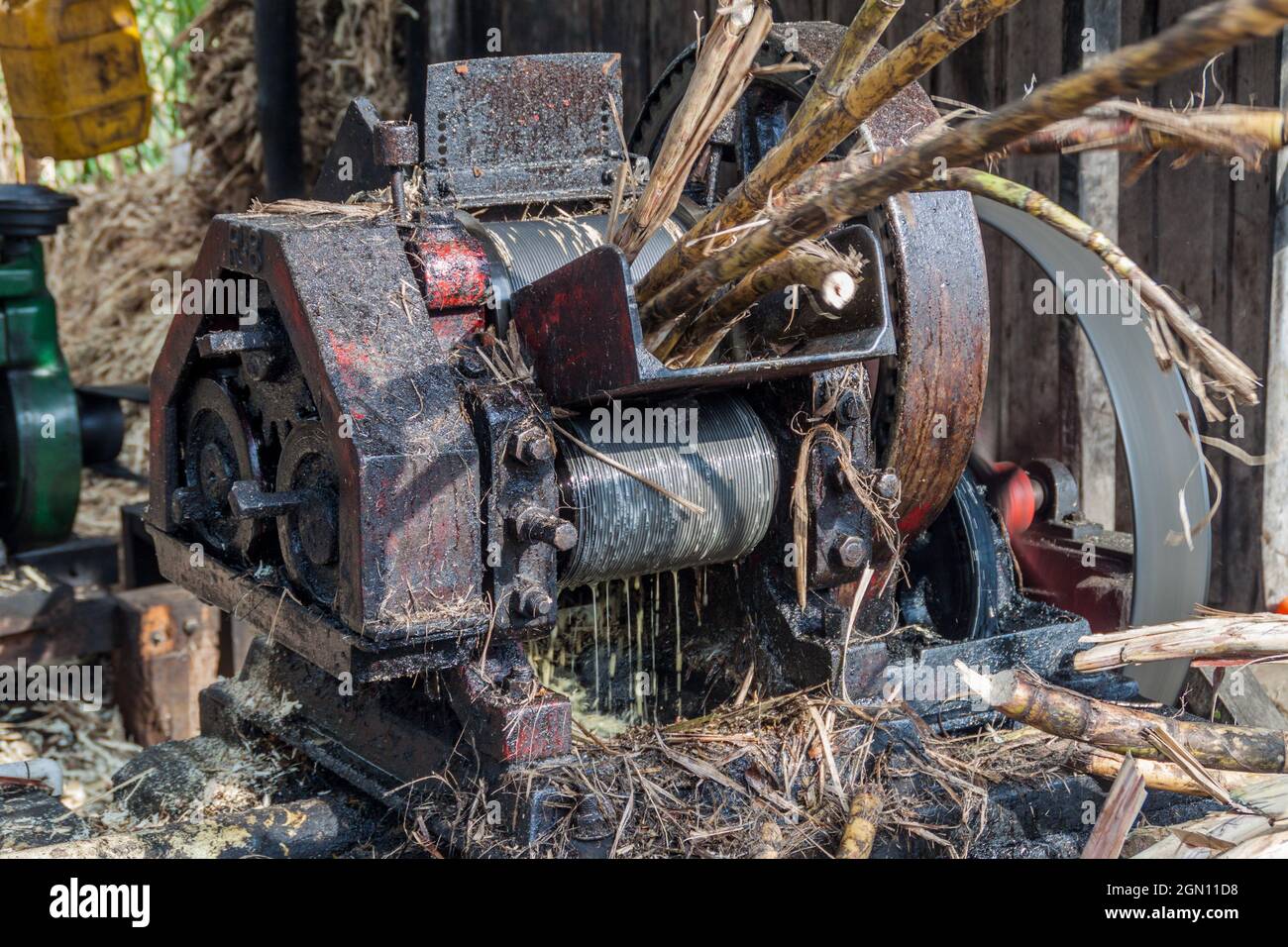 Small sugar cane mill producing panela (unrefined whole cane sugar), in ...