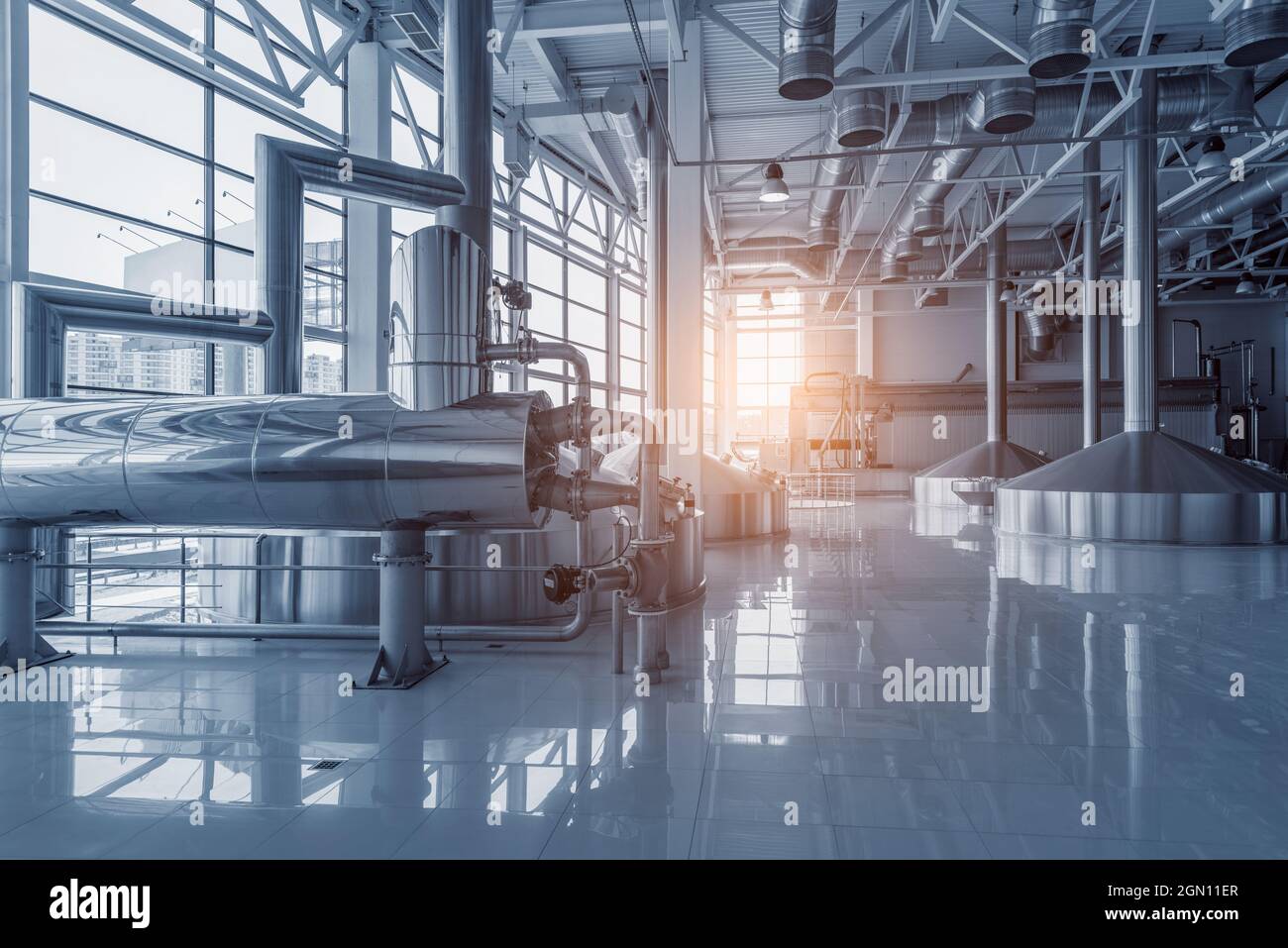 Equipment for brewing beer inside of the plant Stock Photo - Alamy