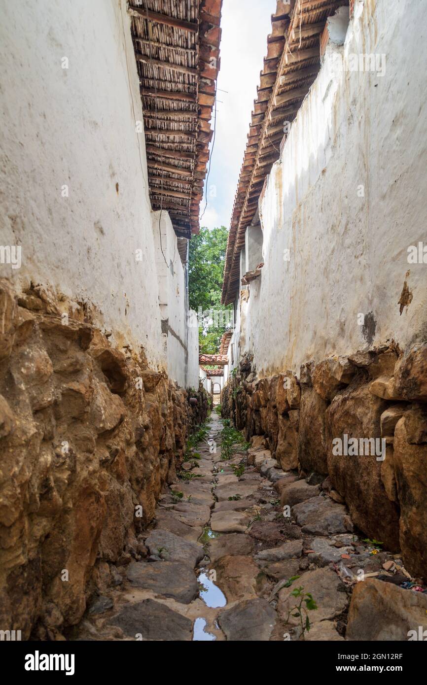 Narrow alley in Guane village, Colombia Stock Photo - Alamy