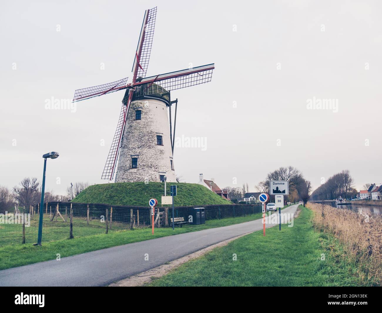 Old windmill called Hoeke against a white sky in Damme, Belgium Stock ...