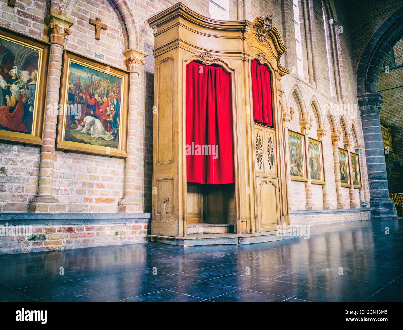 Wooden confessional of the famous historic medieval Church of Our Lady ...