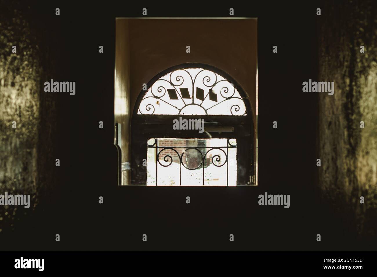 Aged building window and entrance door from the inside in New York, U ...