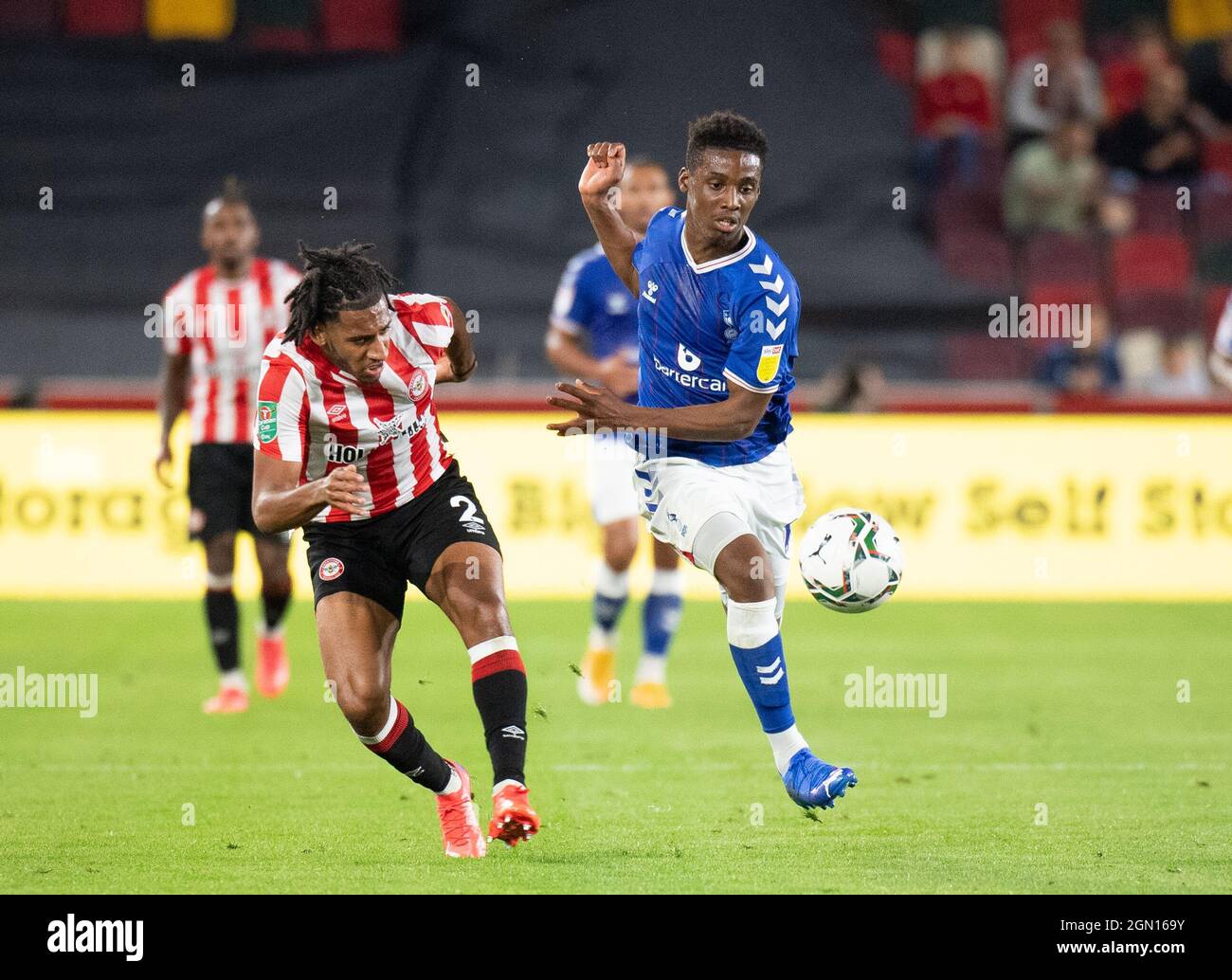 Brentford, UK. 21st Sep, 2021. Oldham Dylan Fage and Brentford Dominic ...