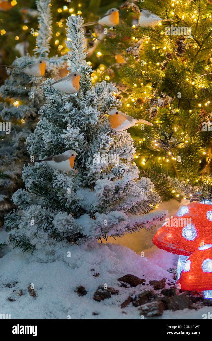 puppet christmas tree with little birds in a fairy snowy forest ...