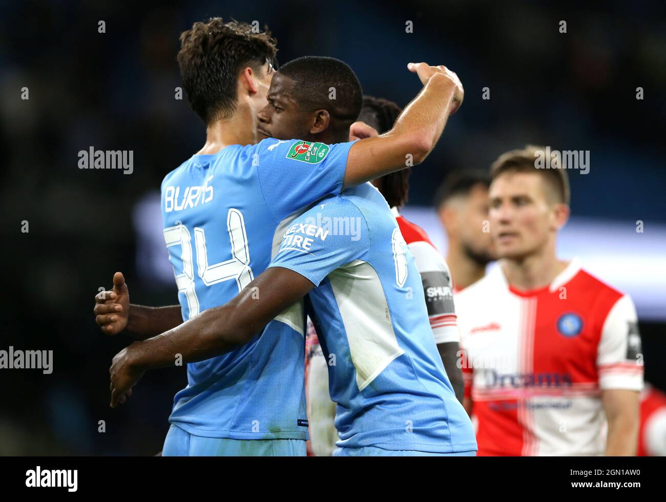 Manchester City's Finley Burns (left) and Luke Mbete-Tabu celebrate ...