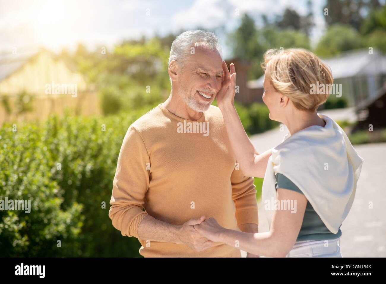 Romantic lady showing affection to her husband Stock Photo - Alamy