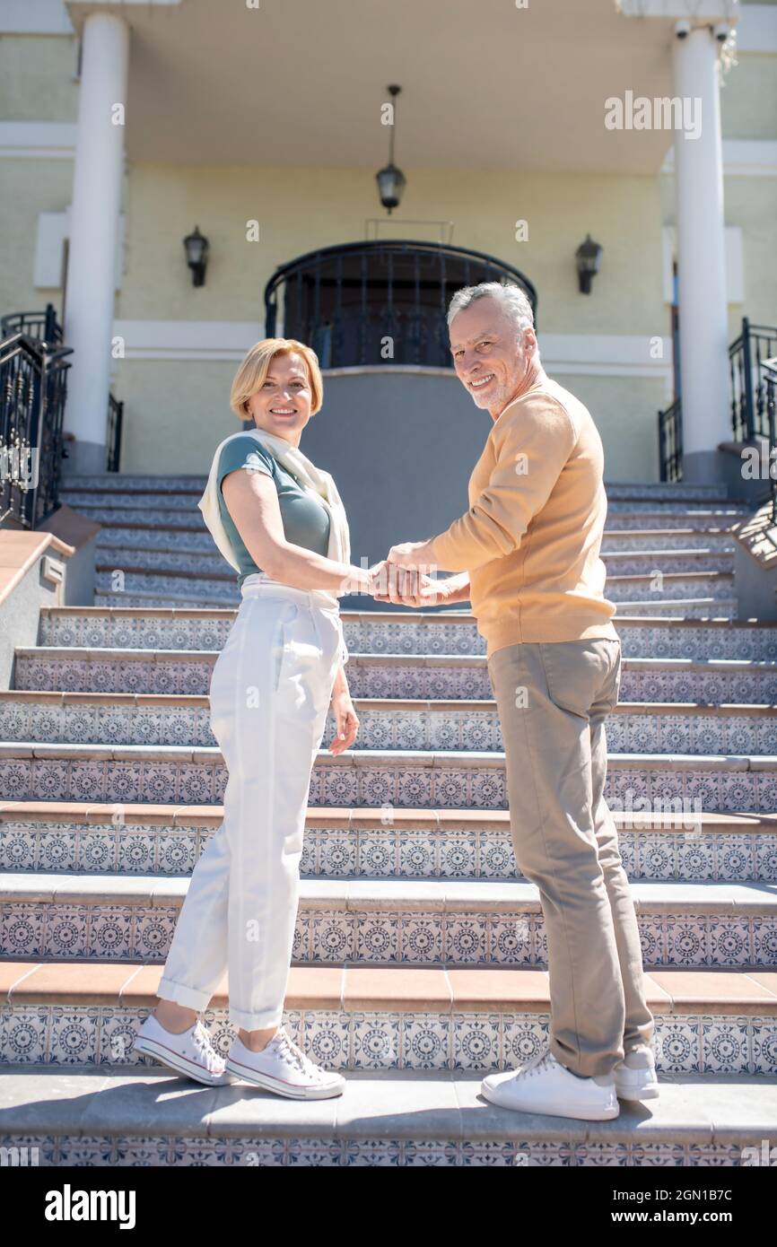 Mature short haired woman posing hi-res stock photography and images ...