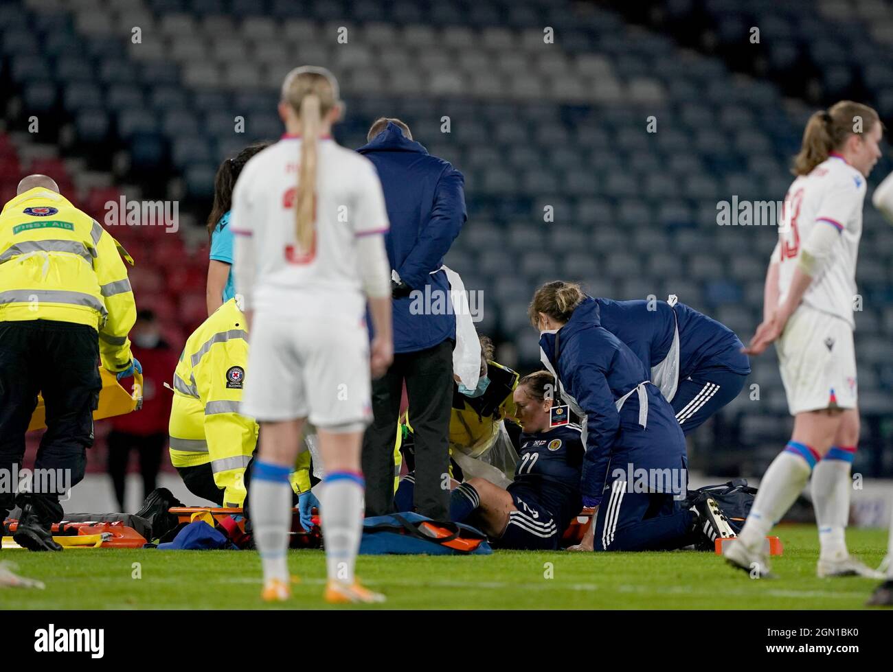 Scotland’s Erin Cuthbert is stretchered off the pitch after picking up ...
