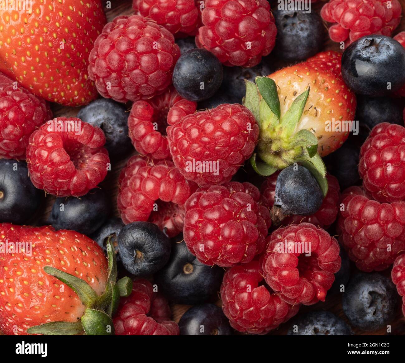 Berries closeup backdrop. Strawberry, raspberry and bluberry Stock ...