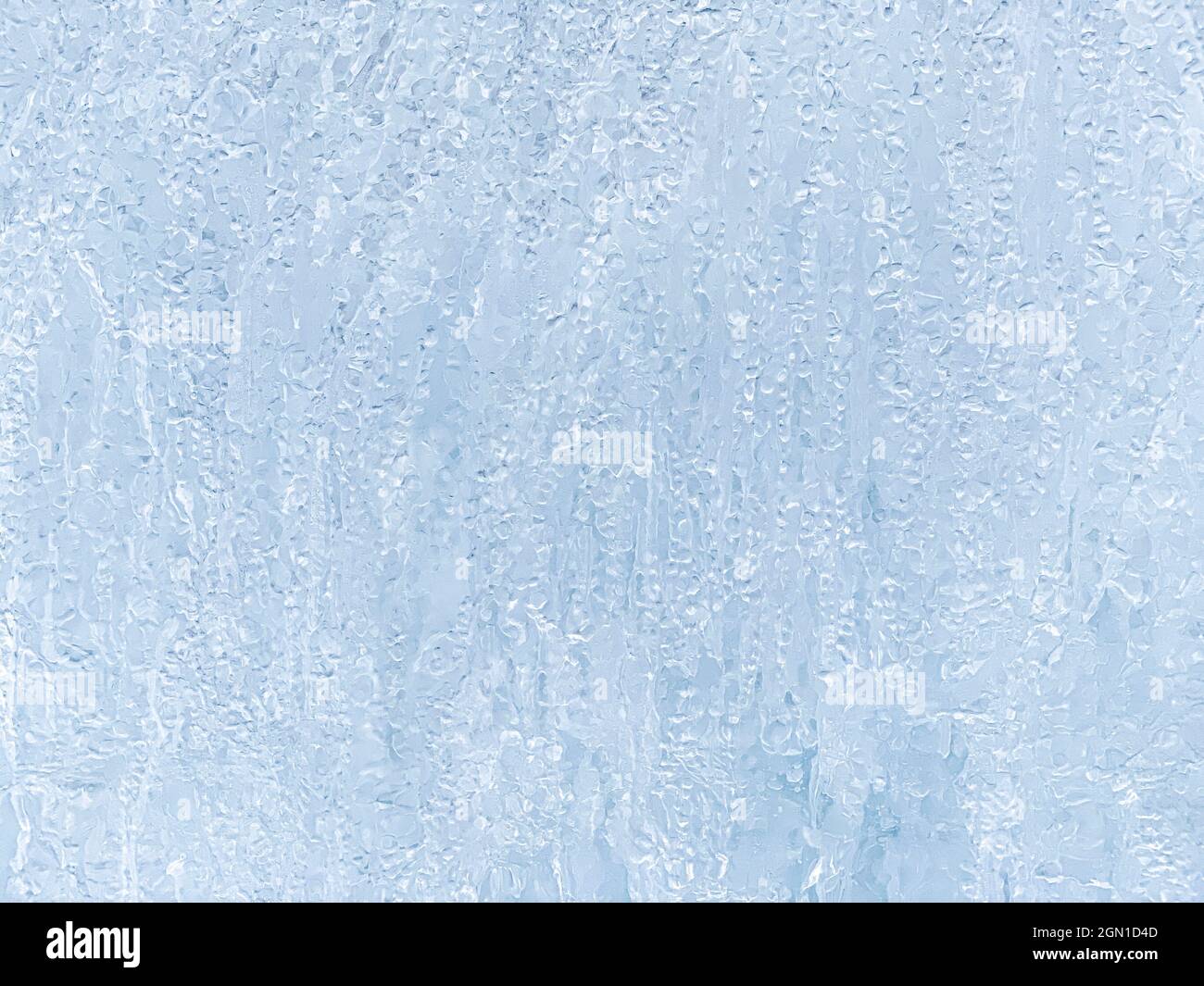 The background is light blue ice. Texture in section Stock Photo - Alamy