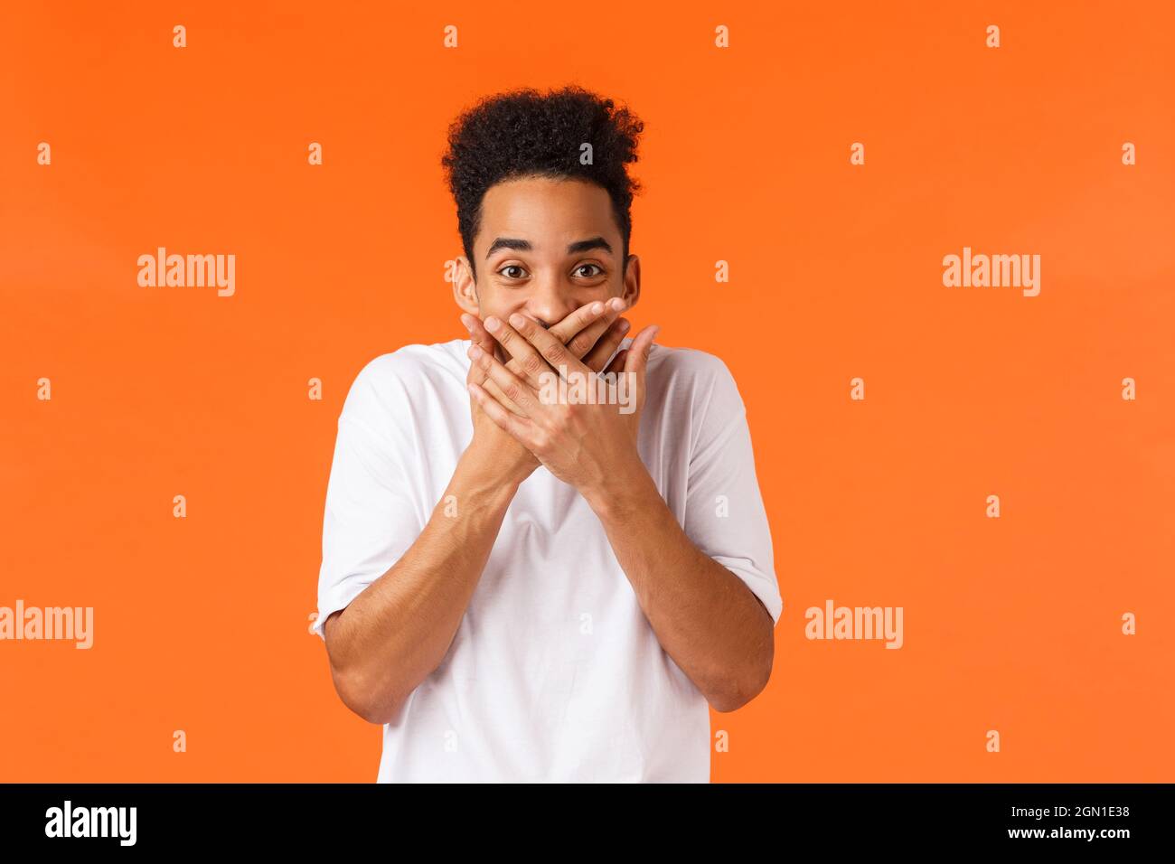 Guy made funny prank trying hold laugh. Hilarious and amused african ...